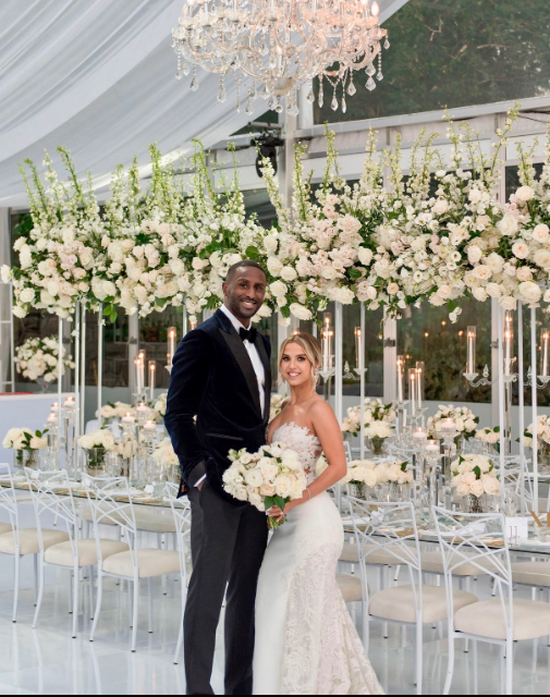 Patrick and Sarah in their respective wedding dresses - Players Bio
